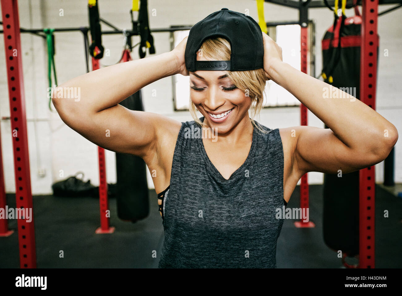 Adjusting hat hi-res stock photography and images - Alamy