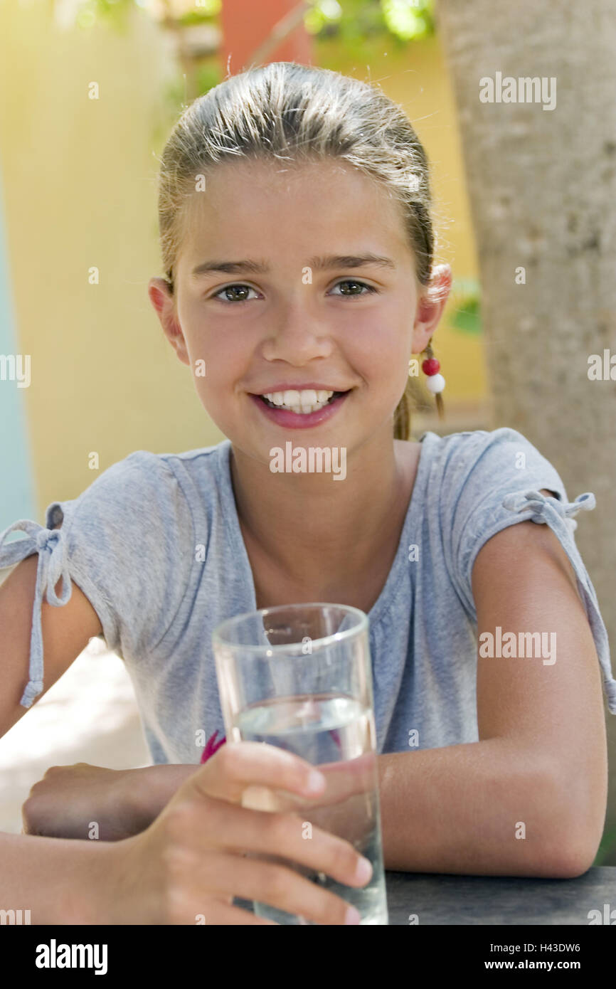 Girls, smile, sit, glass, water, portrait Stock Photo - Alamy