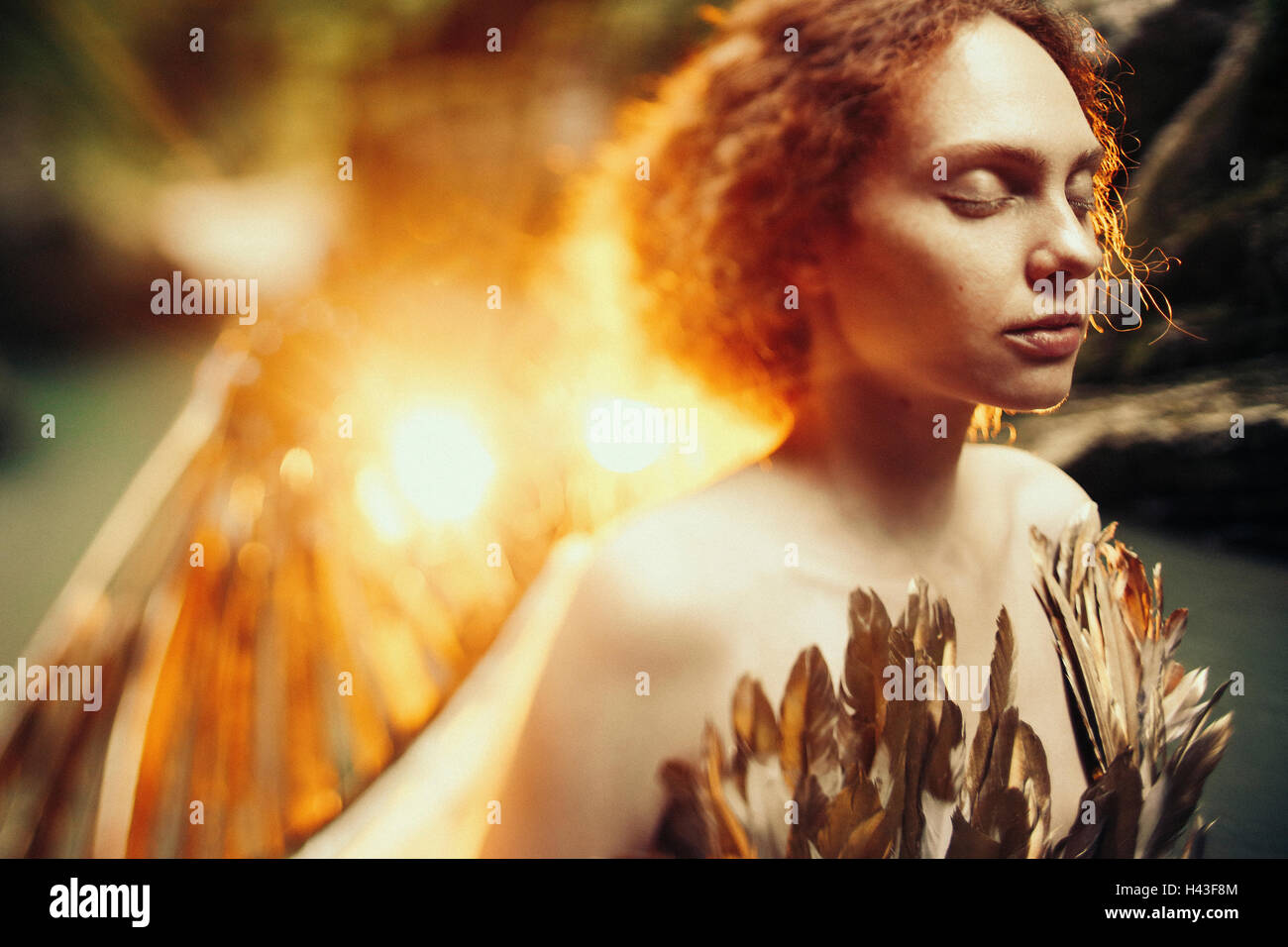 Caucasian woman with angel wings Stock Photo - Alamy