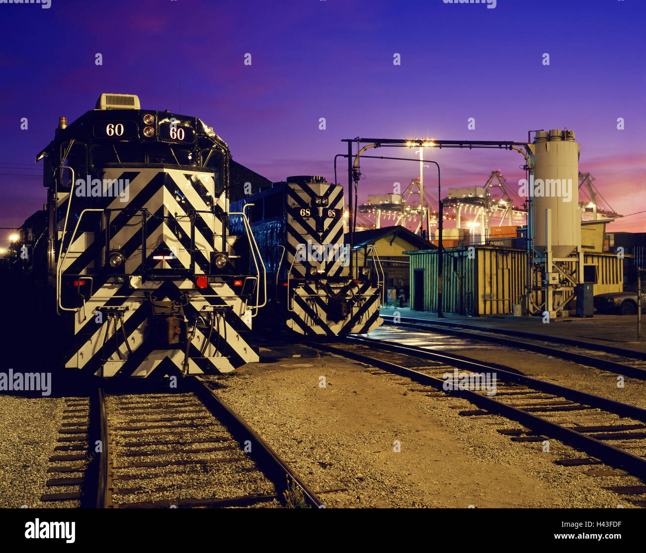Locomotive on train tracks Stock Photo - Alamy
