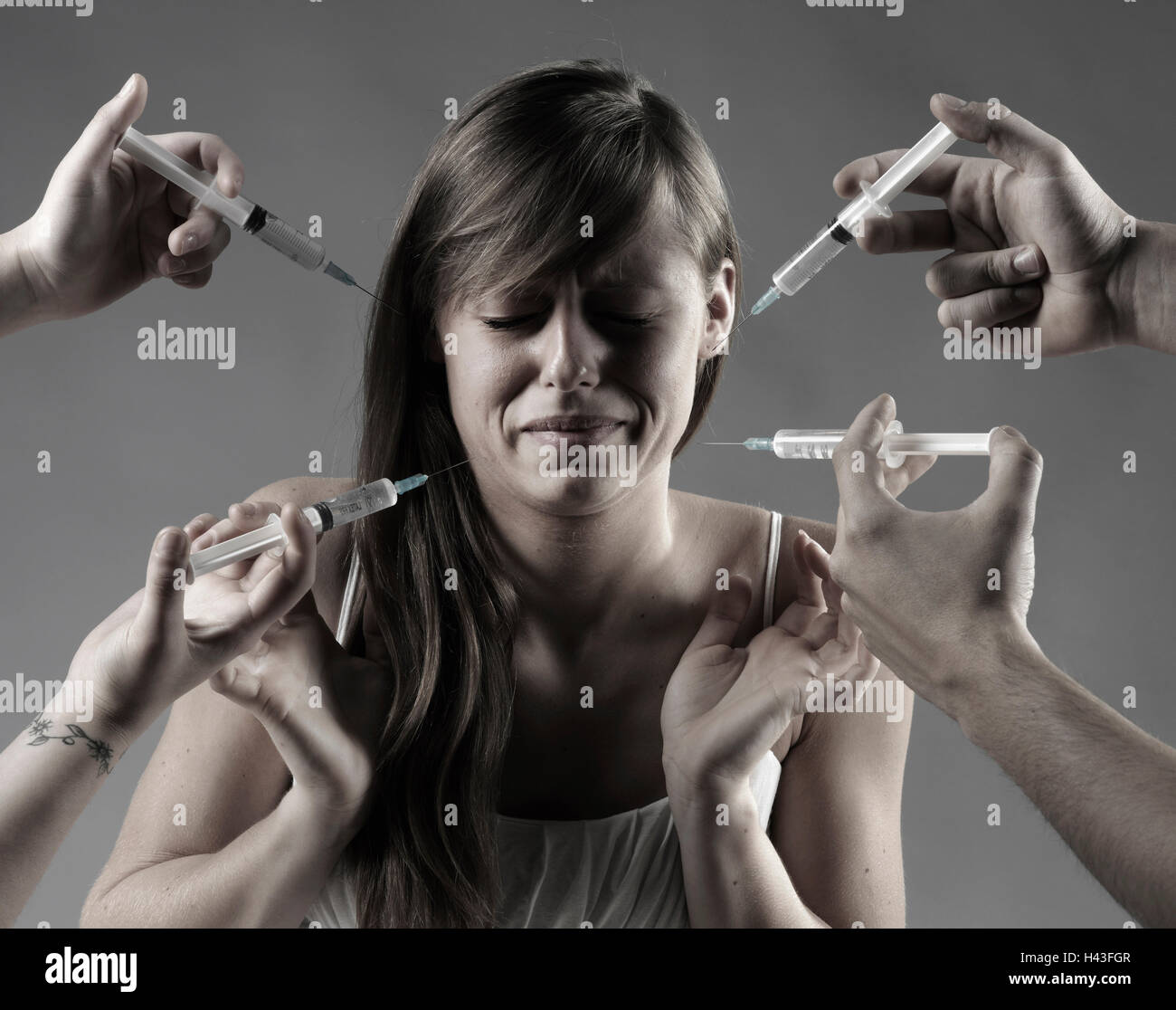 Caucasian woman fearing syringes Stock Photo - Alamy