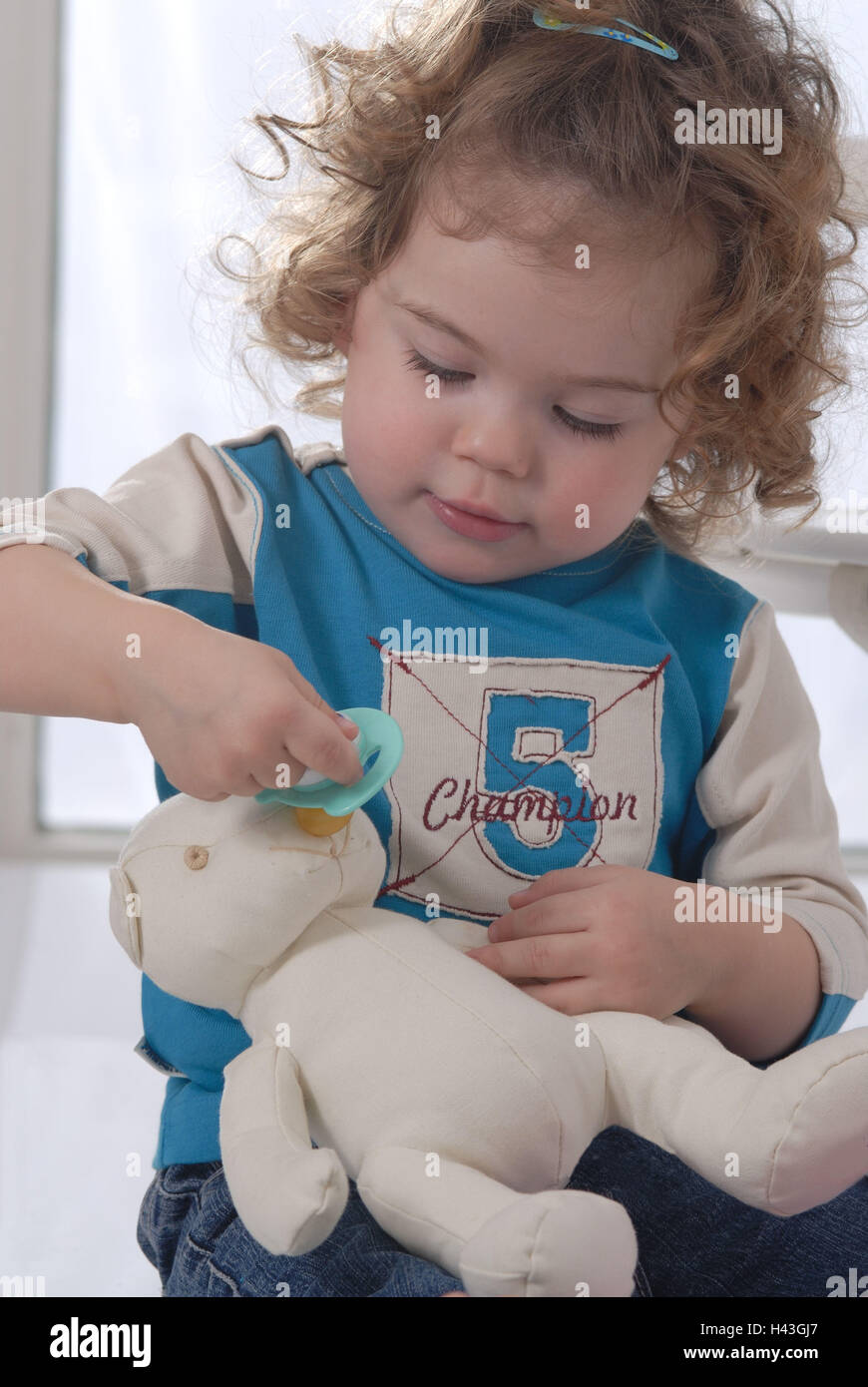 Infant, girl, teddy bear, play Stock Photo - Alamy
