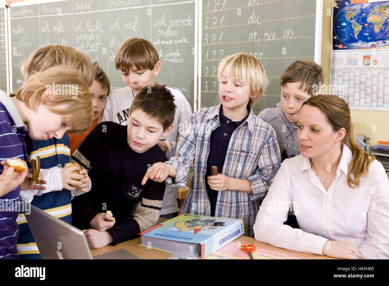 Classroom, teacher, schoolboy, break, entertainment Stock Photo - Alamy