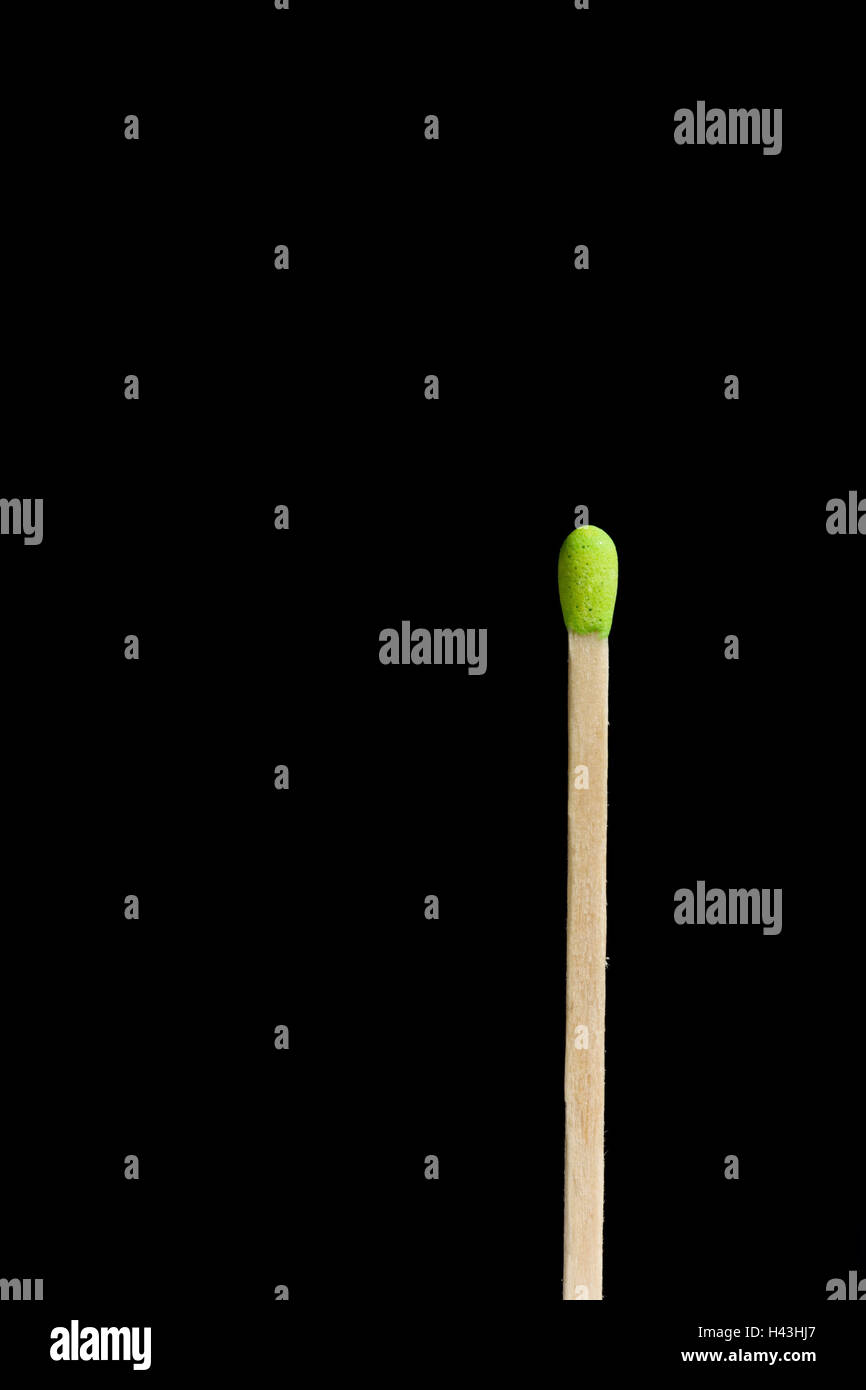 Match, green, cut out, background black Stock Photo - Alamy