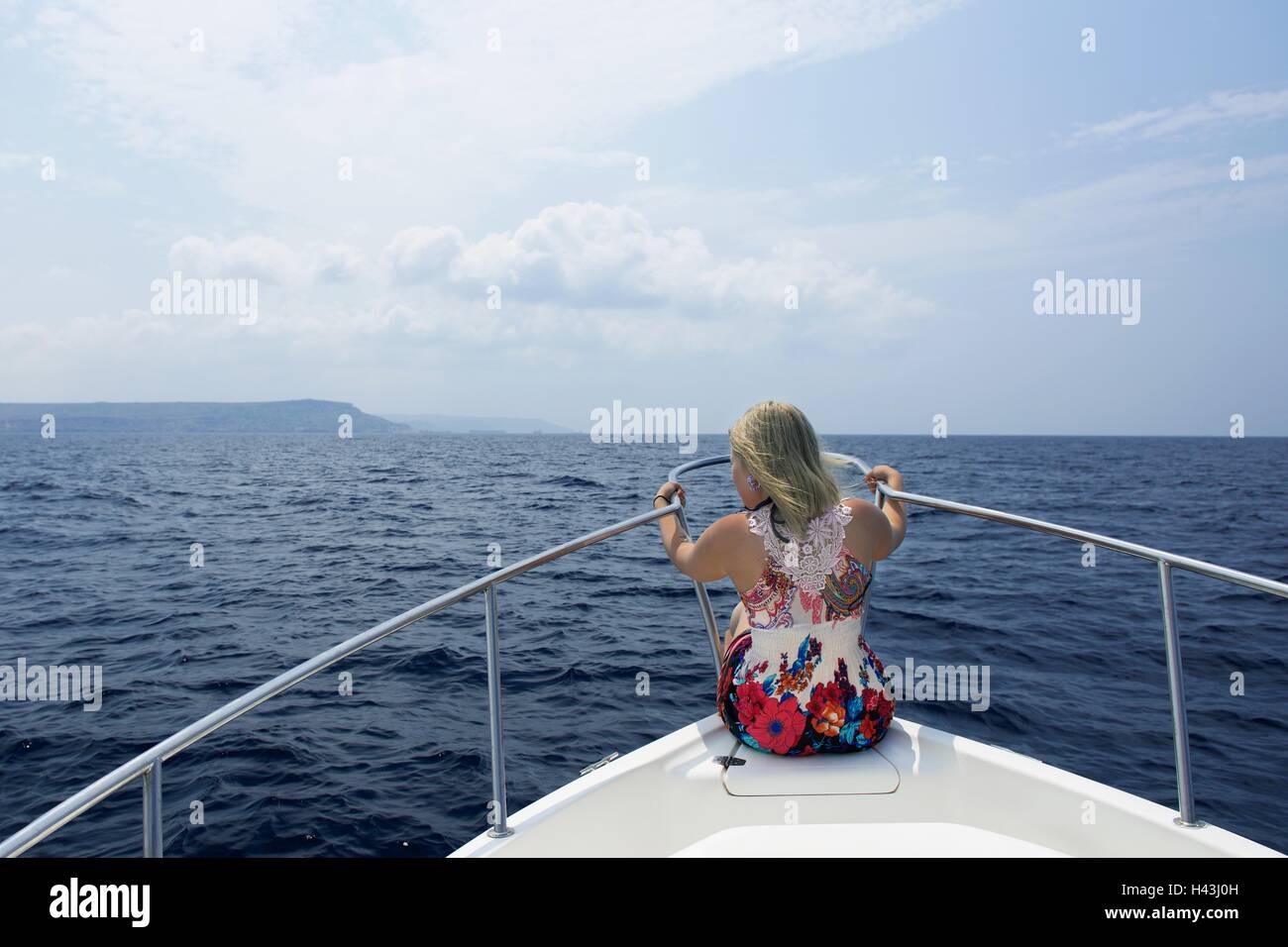 Woman sitting on bow boat hi-res stock photography and images - Alamy