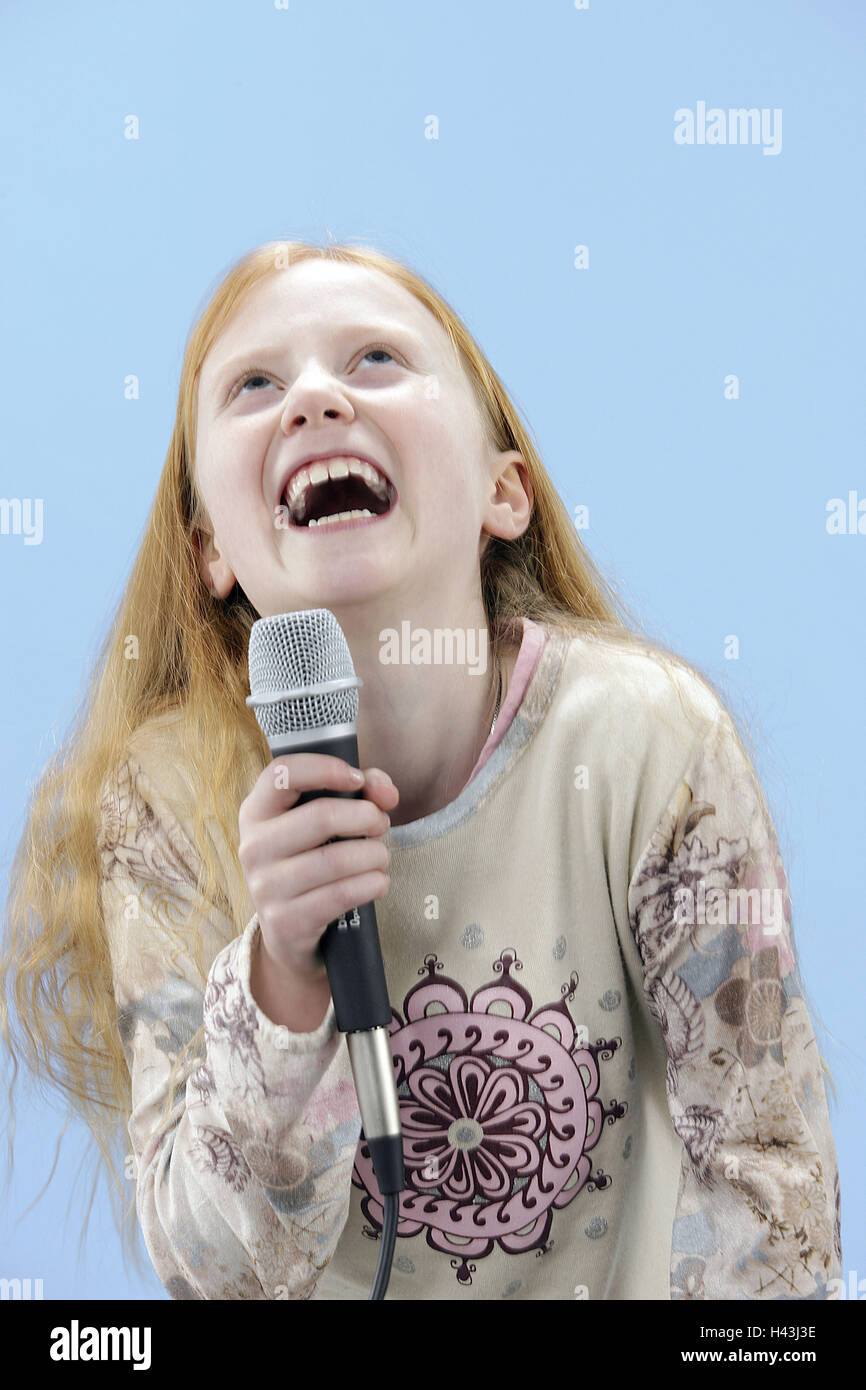 Girls, microphone, sing, portrait Stock Photo - Alamy