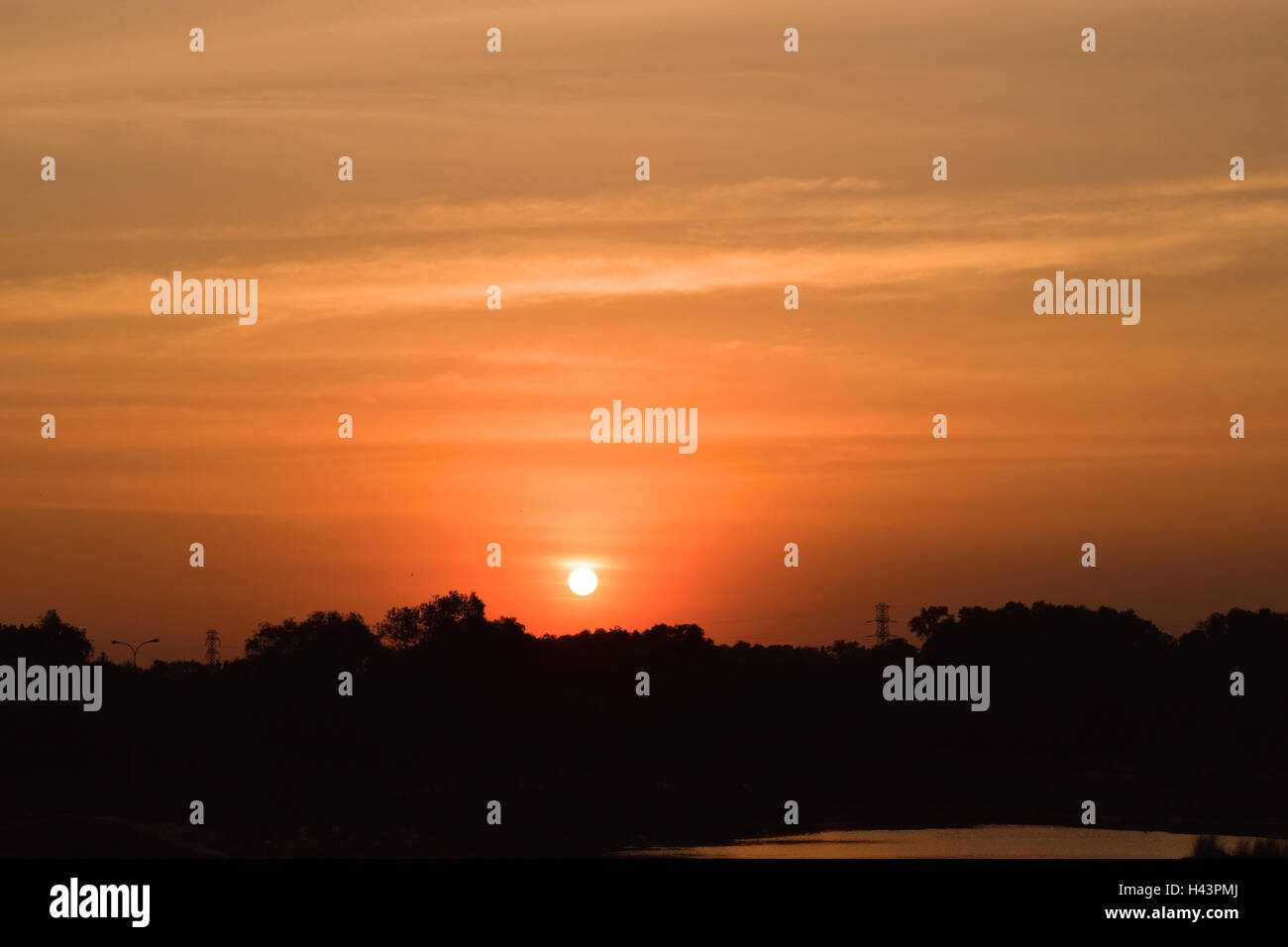 sunset sky with the sun behind the scence Stock Photo - Alamy