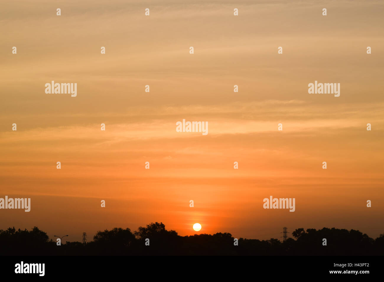 sunset sky with the sun behind the scence Stock Photo - Alamy