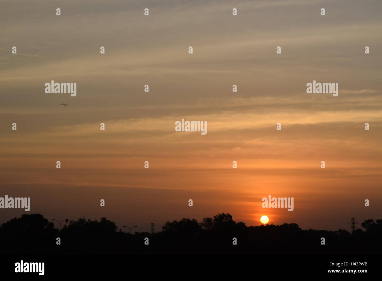 sunset sky with the sun behind the scence Stock Photo - Alamy