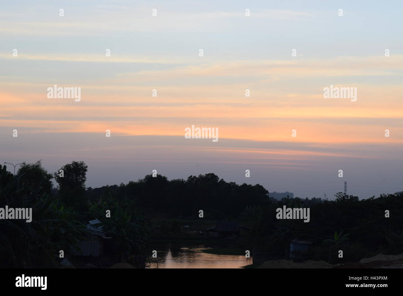 sunset sky with the sun behind the scence Stock Photo - Alamy