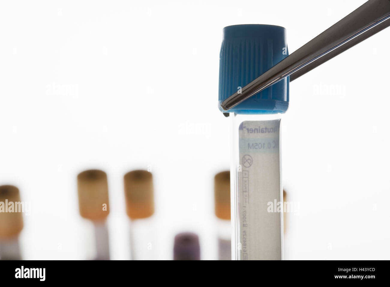 Blood tests, tubes, tweezers, hold, detail Stock Photo - Alamy