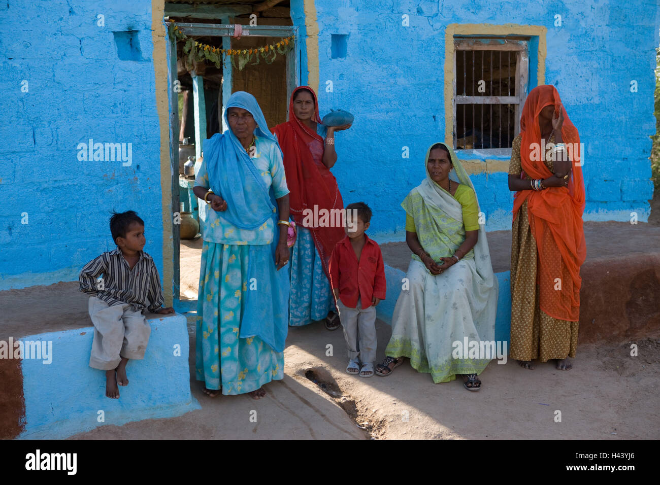 India, Rajasthan, Luni, house, facade, blue, women, children, group ...