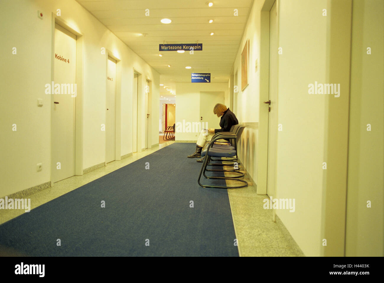 Hospital hall, waiting range, woman, sit, side view, no model release ...