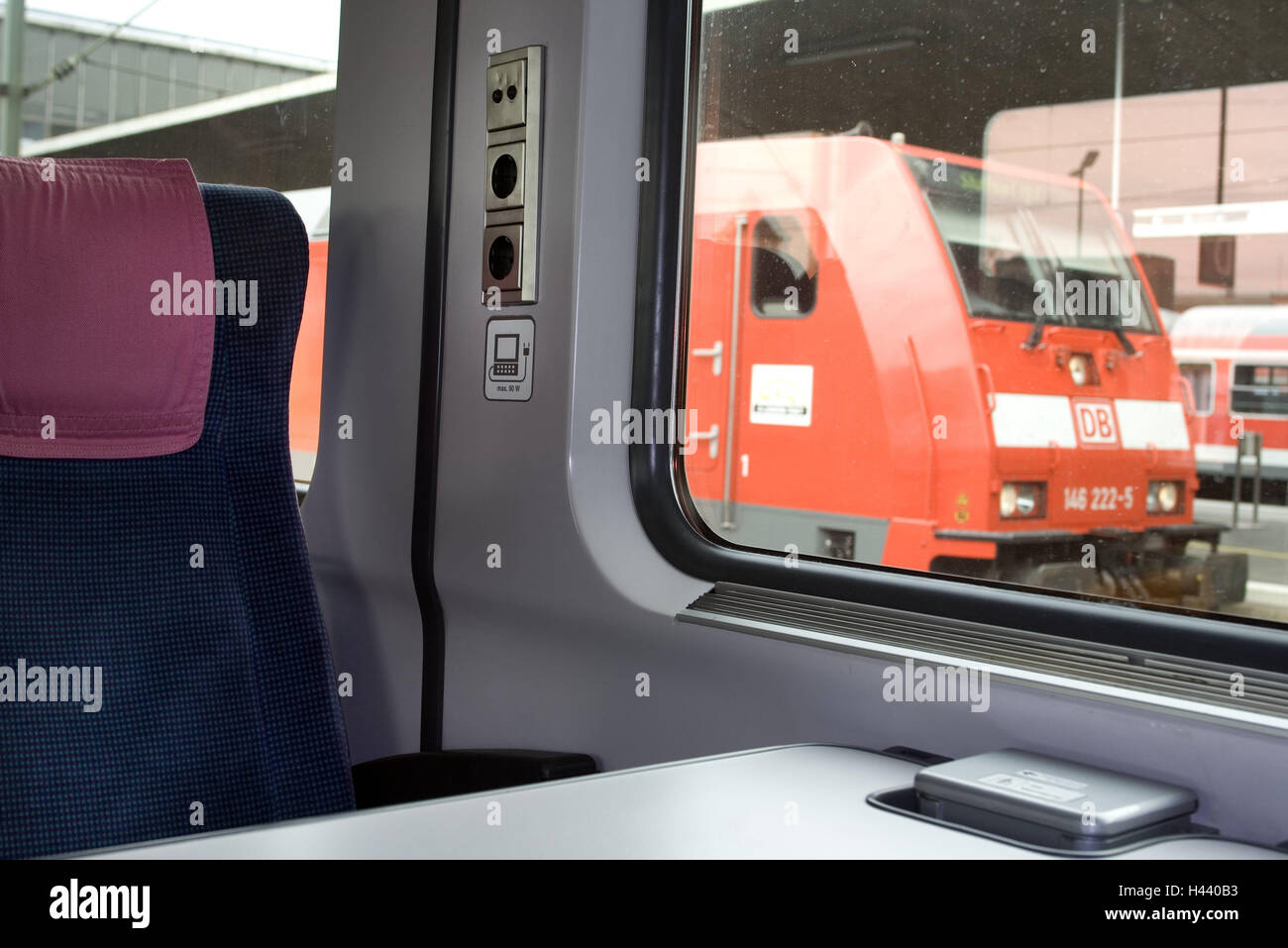 Train compartment, seat, sockets, windows, view, nobody, trajectory ...