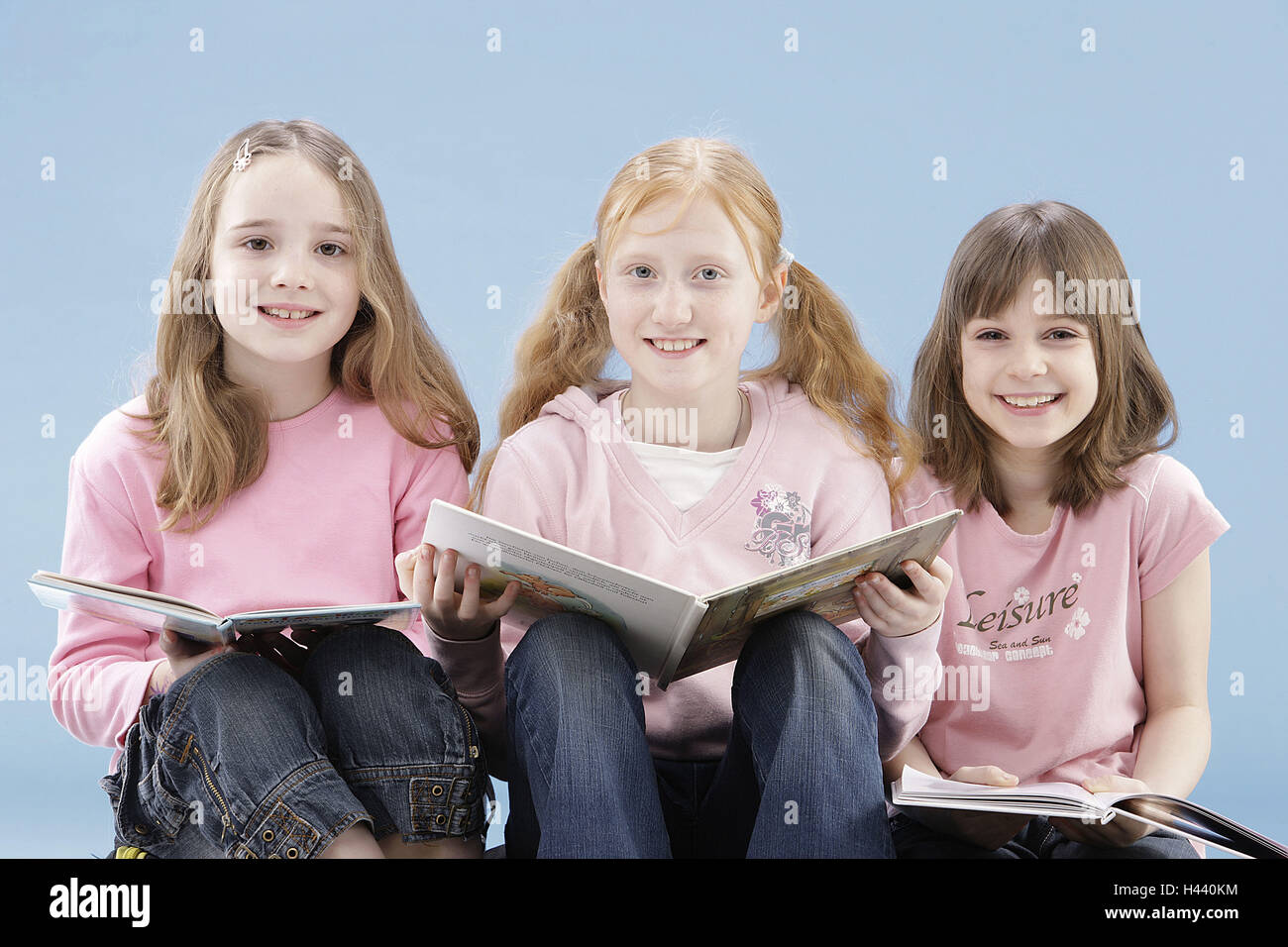 Three books hi-res stock photography and images - Alamy