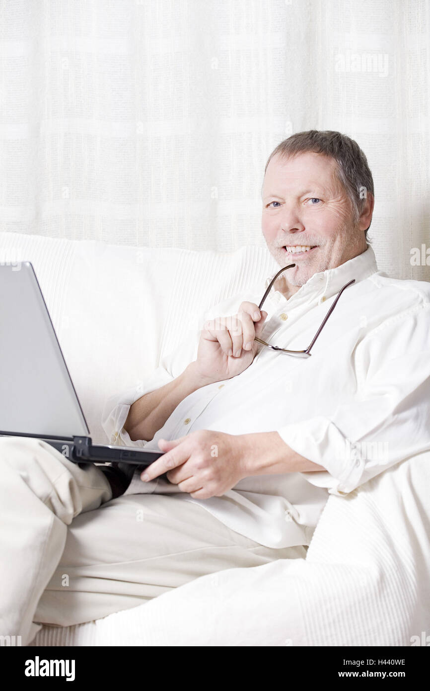 Boss, smile, sit, glasses, hold, laptop, detail, model released Stock ...