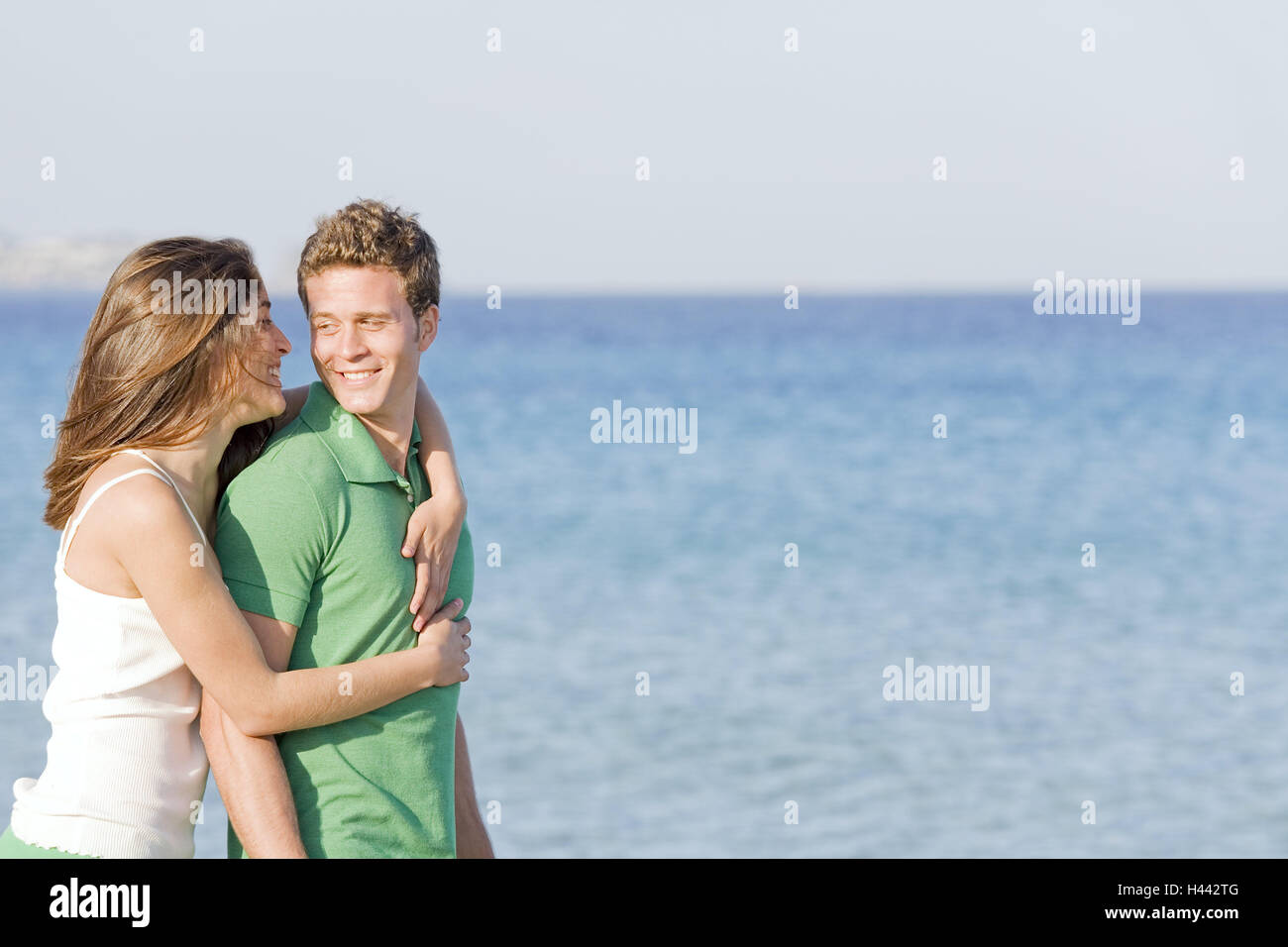 Beach, couple, young, falls in love, eye contact, smile, page portrait ...