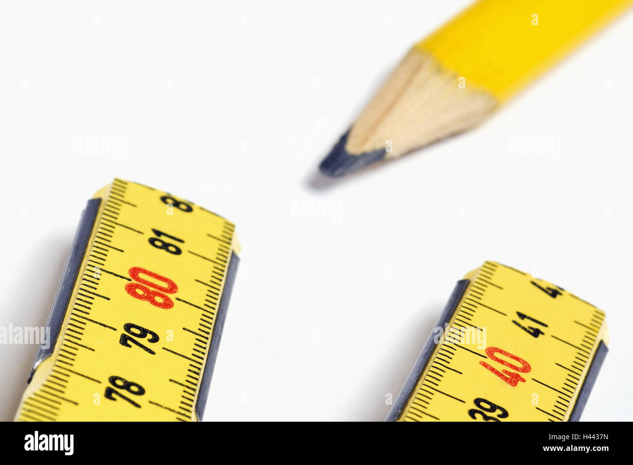 Folding rule, pencil, medium close-up, detail, yard stick, measuring ...