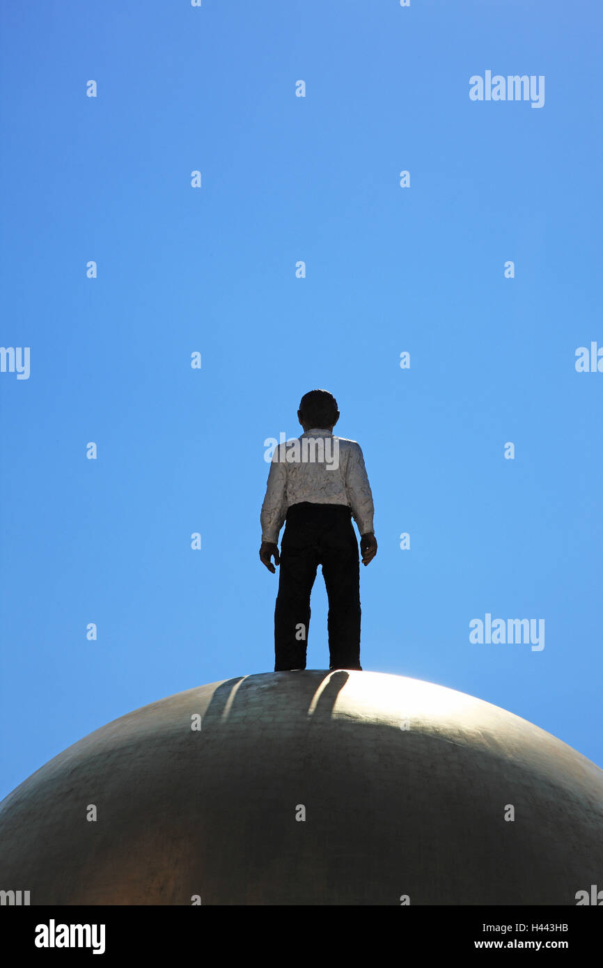 Statue, sphere, figure, back view Stock Photo - Alamy