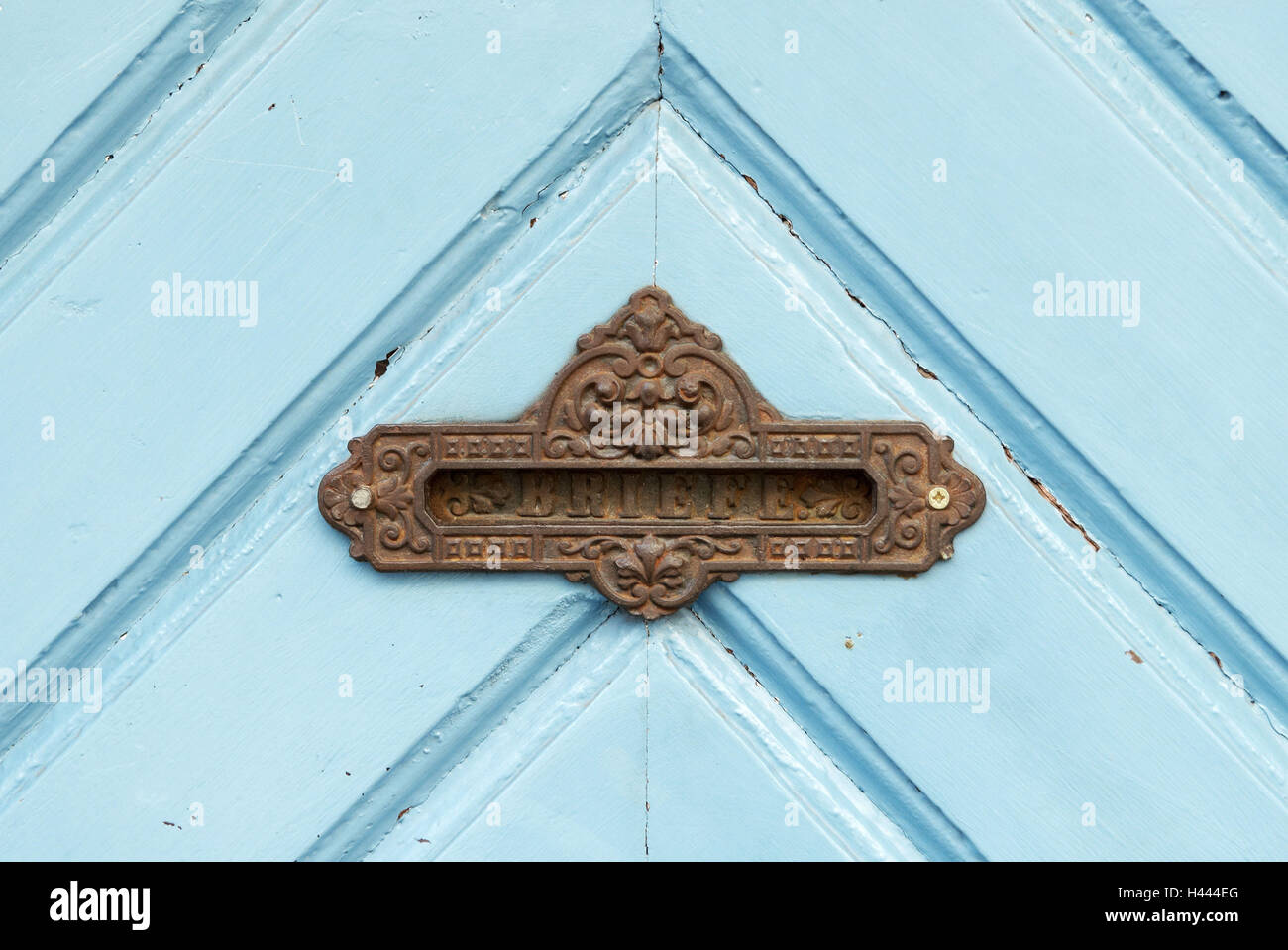 Letter slot, label, door, blue Stock Photo - Alamy