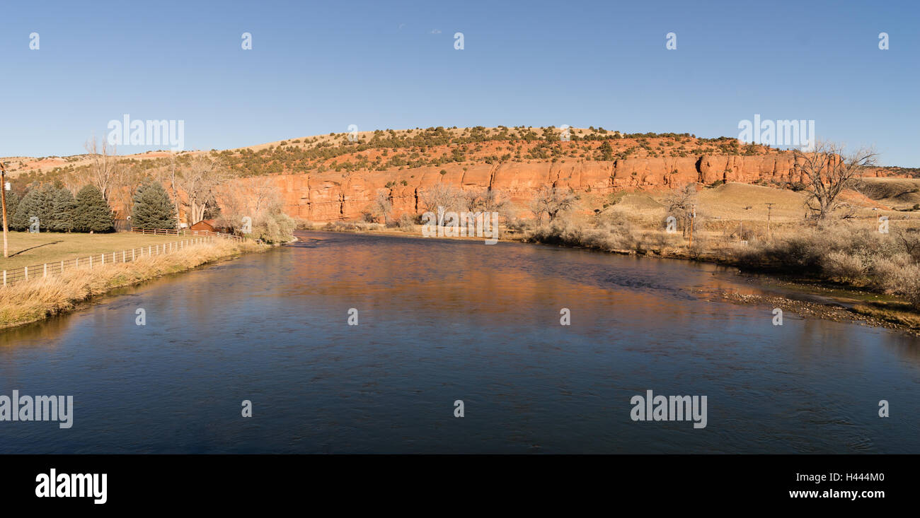 The Bighorn River passes under the road south of Thermopolis Wyoming ...