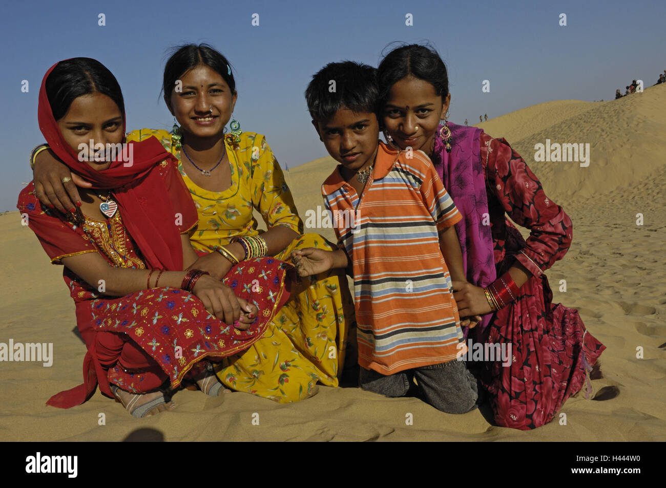 Desert, girl, boy, smile, group picture, no model release Stock Photo ...