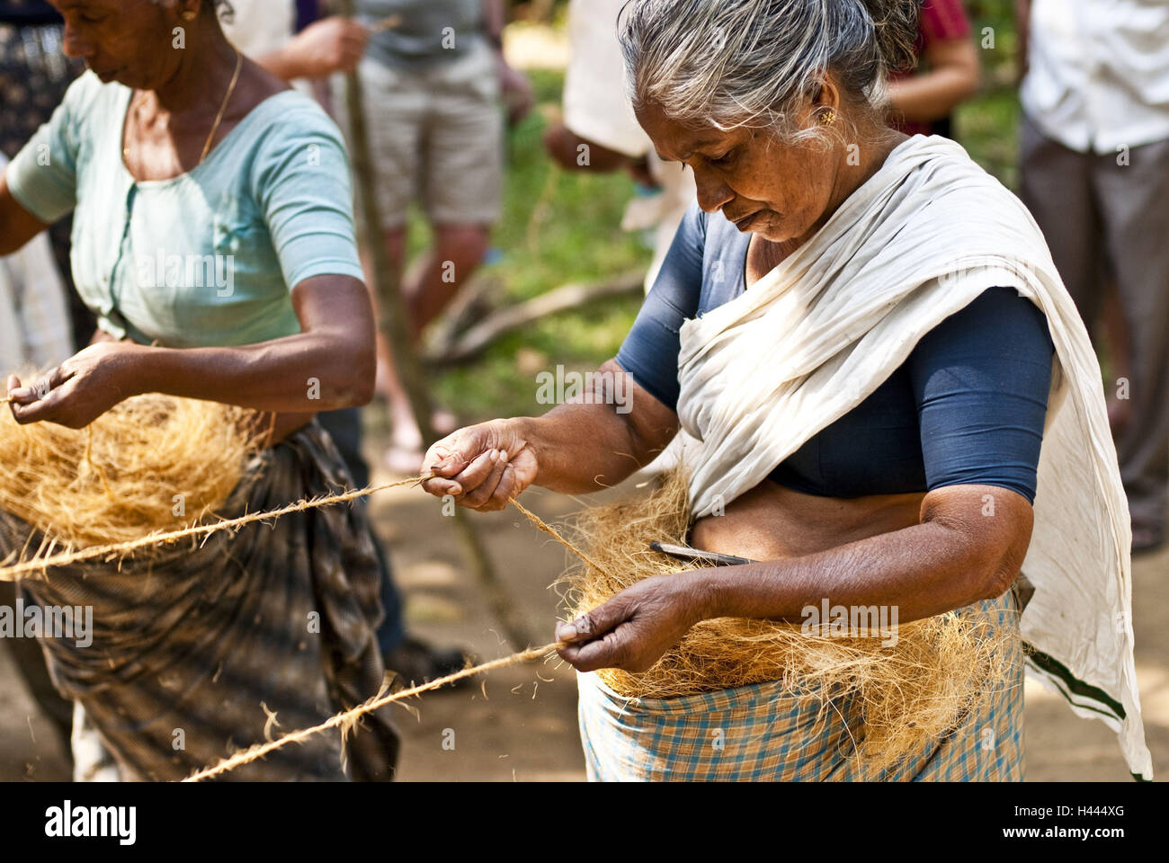 India, women, coconut palm fibers, process, turn Stock Photo - Alamy