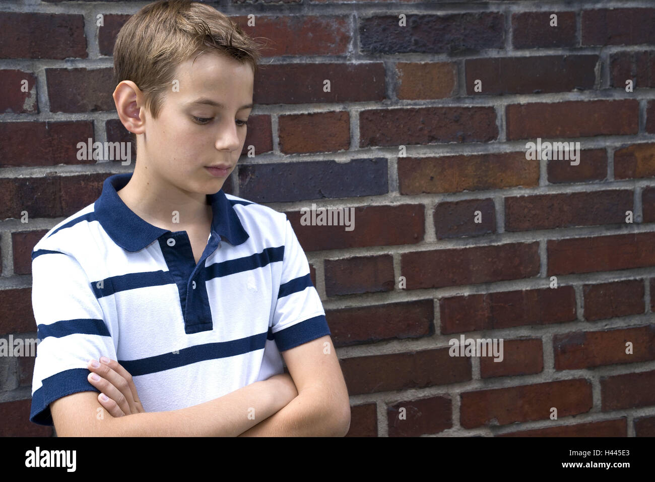 Defensive arms crossed hi-res stock photography and images - Alamy