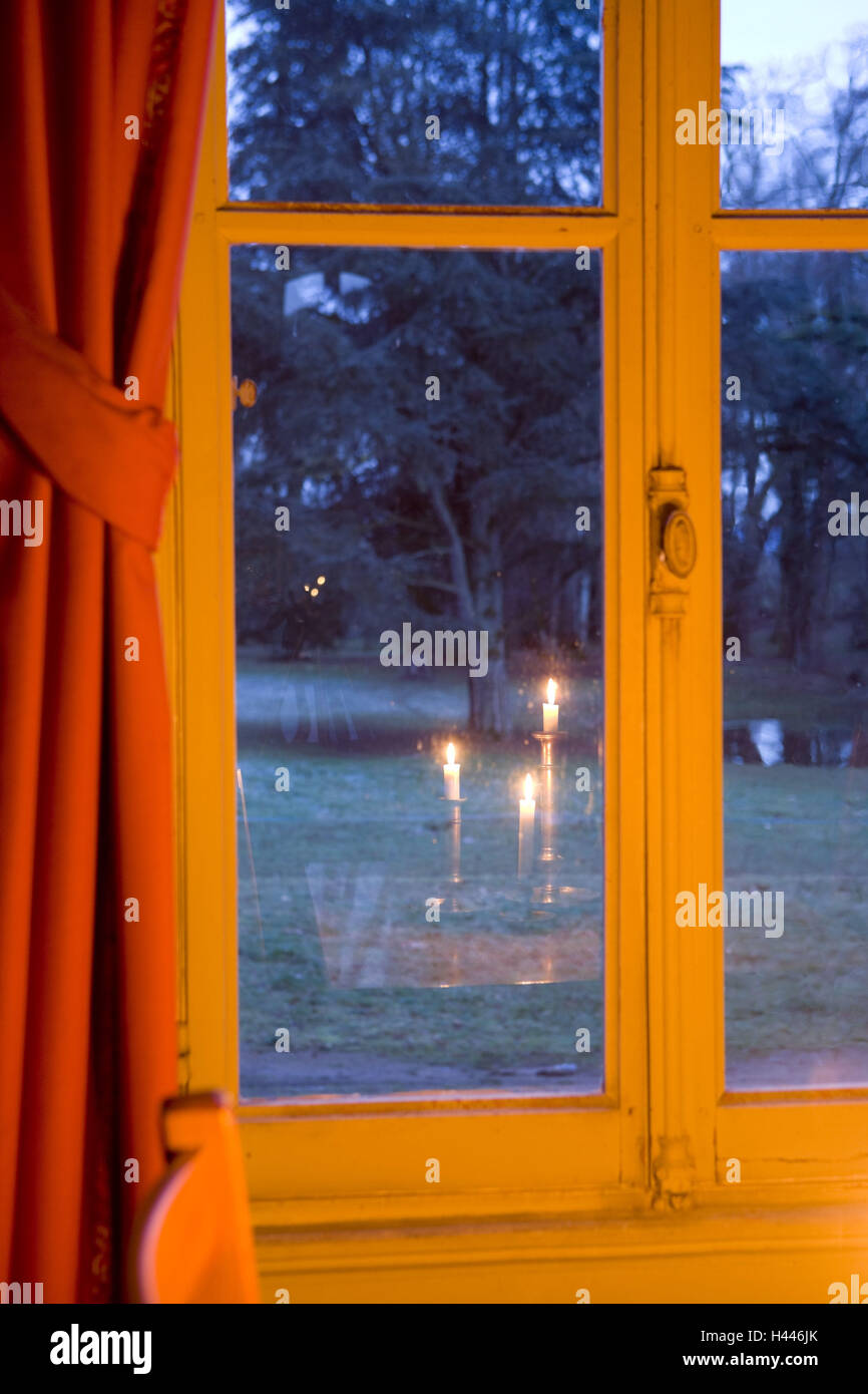 Living sroom, candle light, window, reflection, view, garden, dusk ...