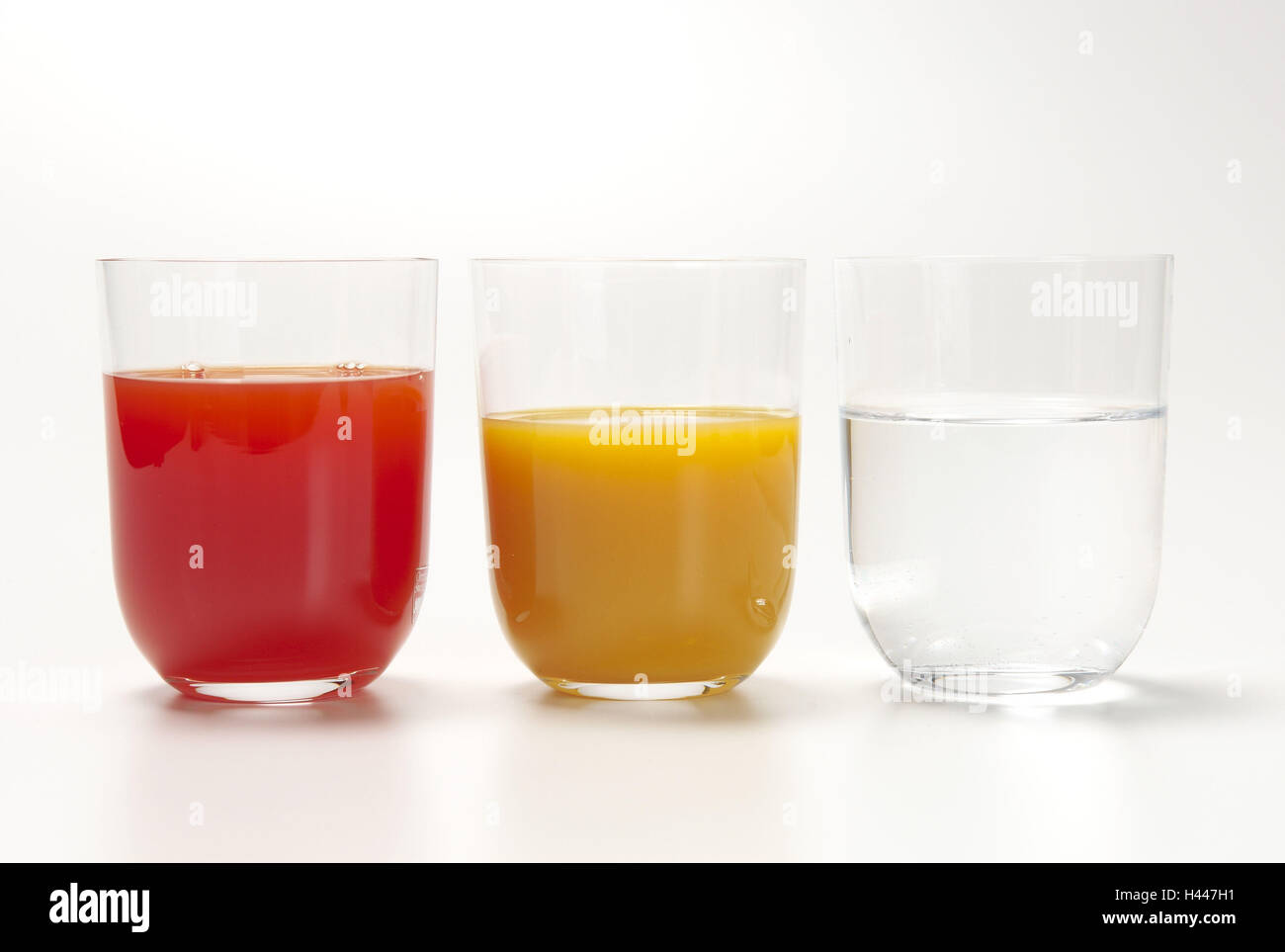 Glasses, water, juice, orange juice Stock Photo - Alamy