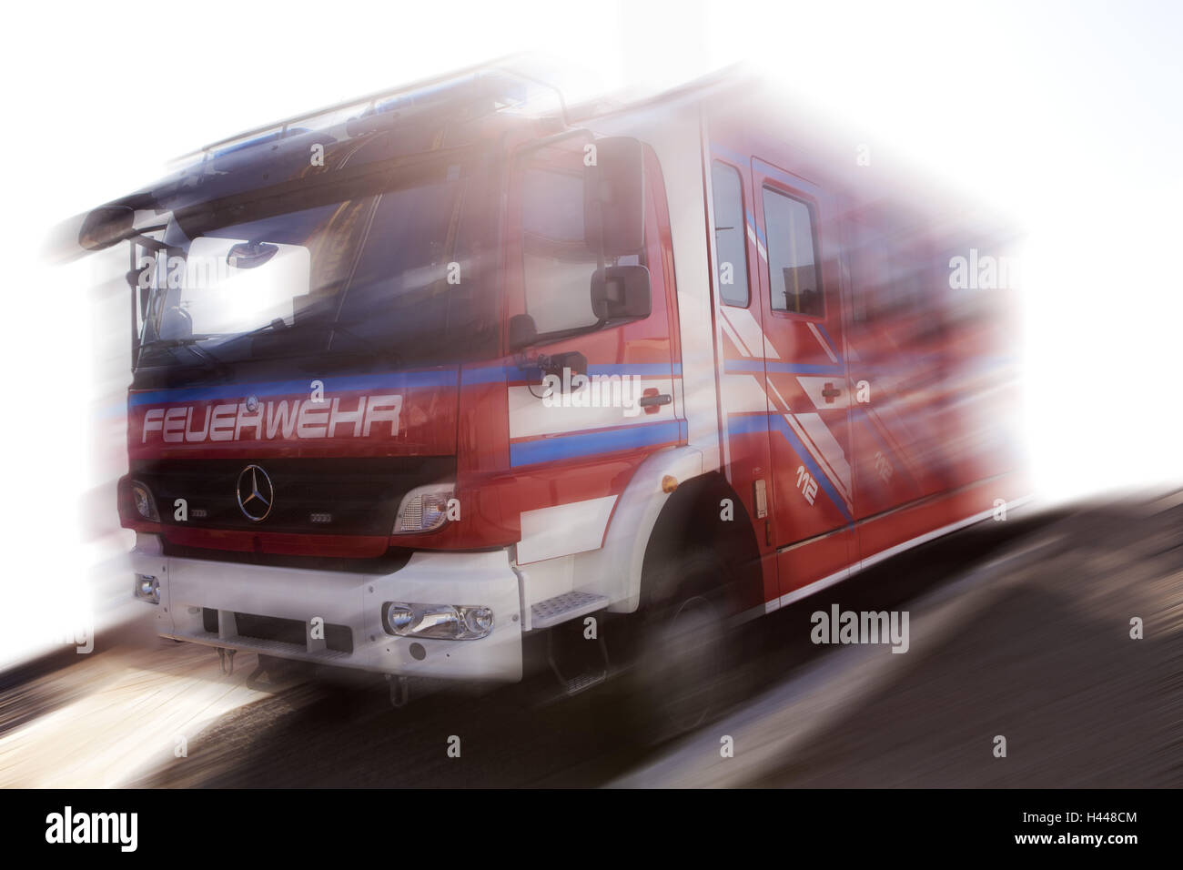 Fire engine in use entry Stock Photo - Alamy