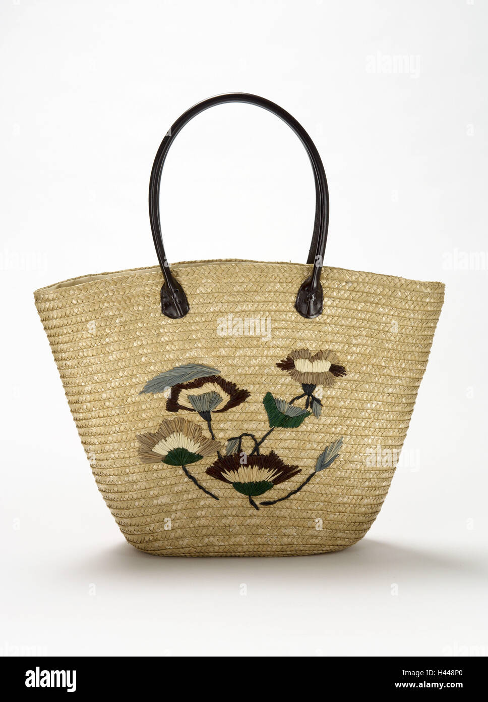 Wicker bag, floral design Stock Photo - Alamy