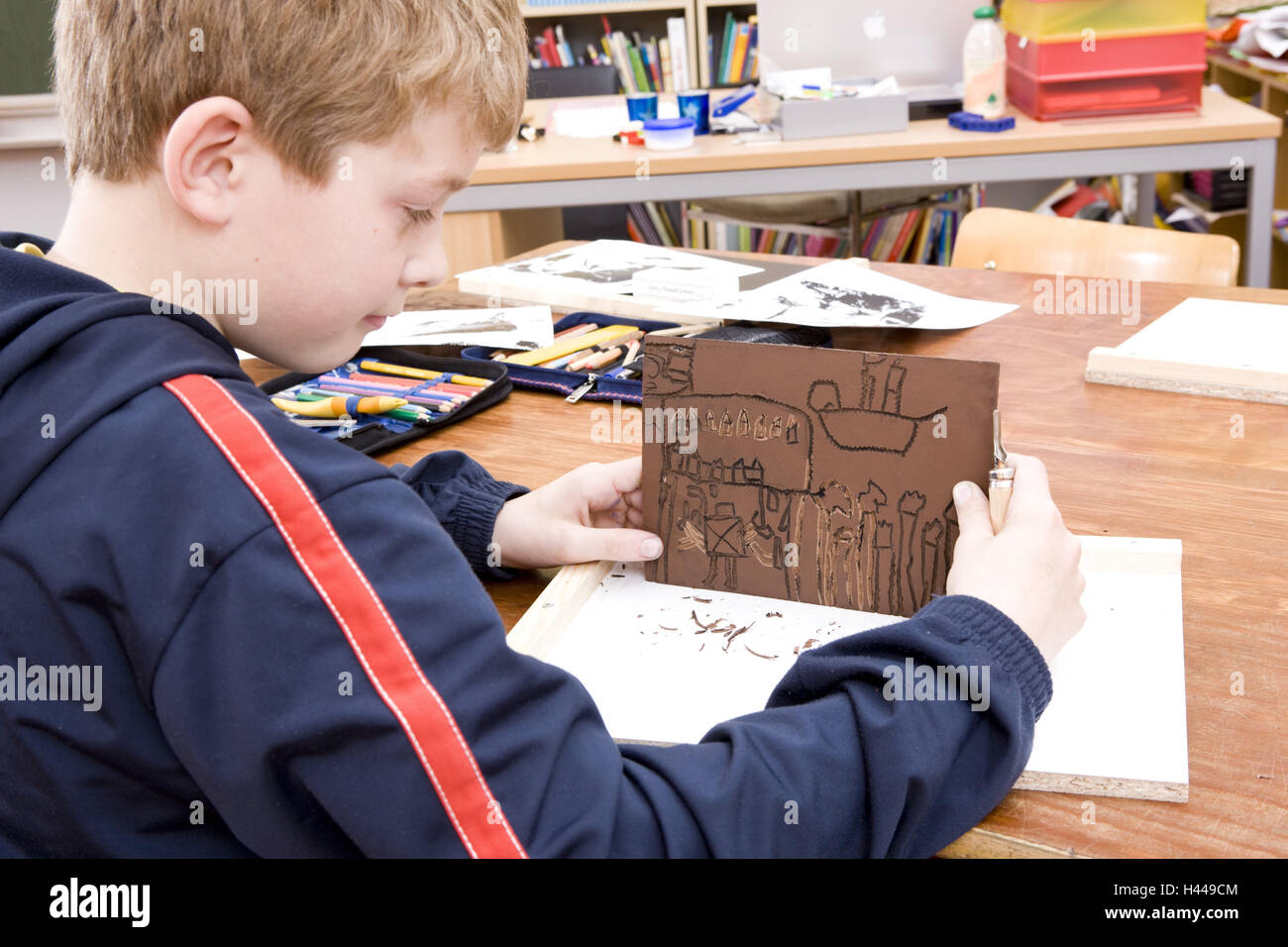 Classrooms, art lessons, boy, linocut, look Stock Photo - Alamy