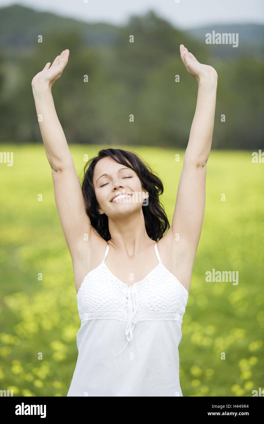 Woman, smile young, brunette, eyes closed, arms rised, portrait, model ...