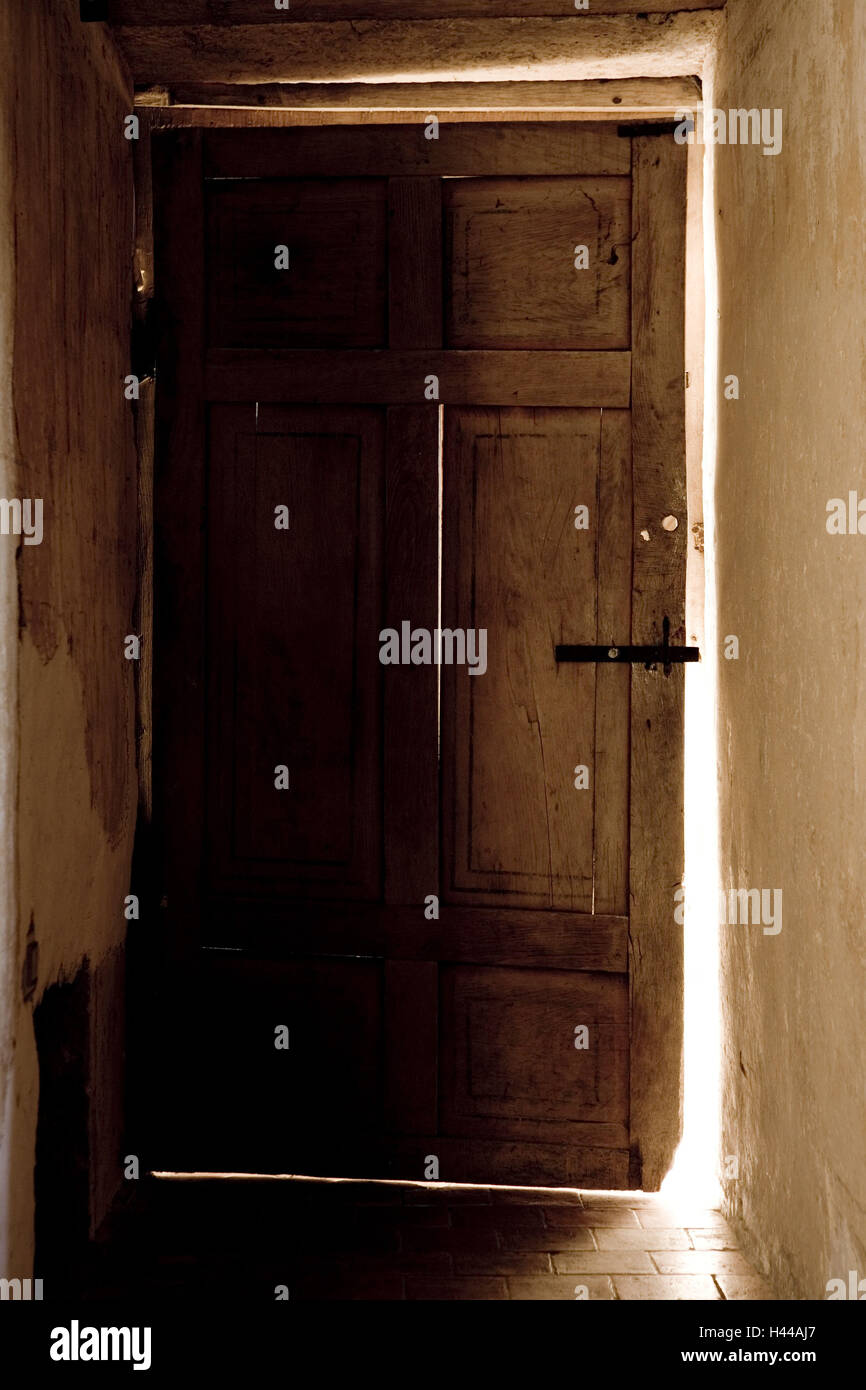 Wooden door, beam of light Stock Photo - Alamy