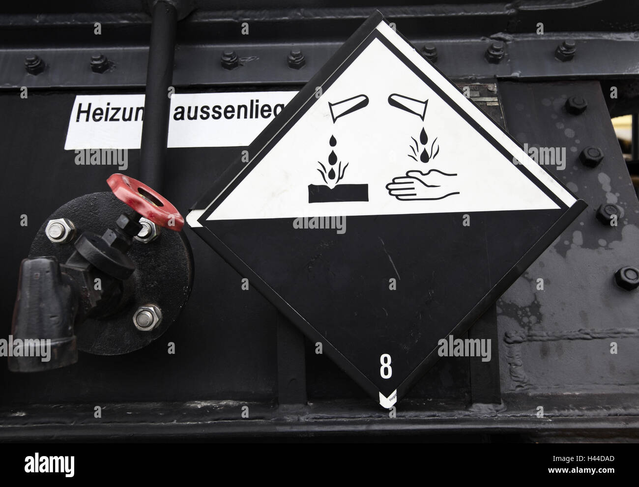Valves at a tank truck, sign, detail Stock Photo - Alamy