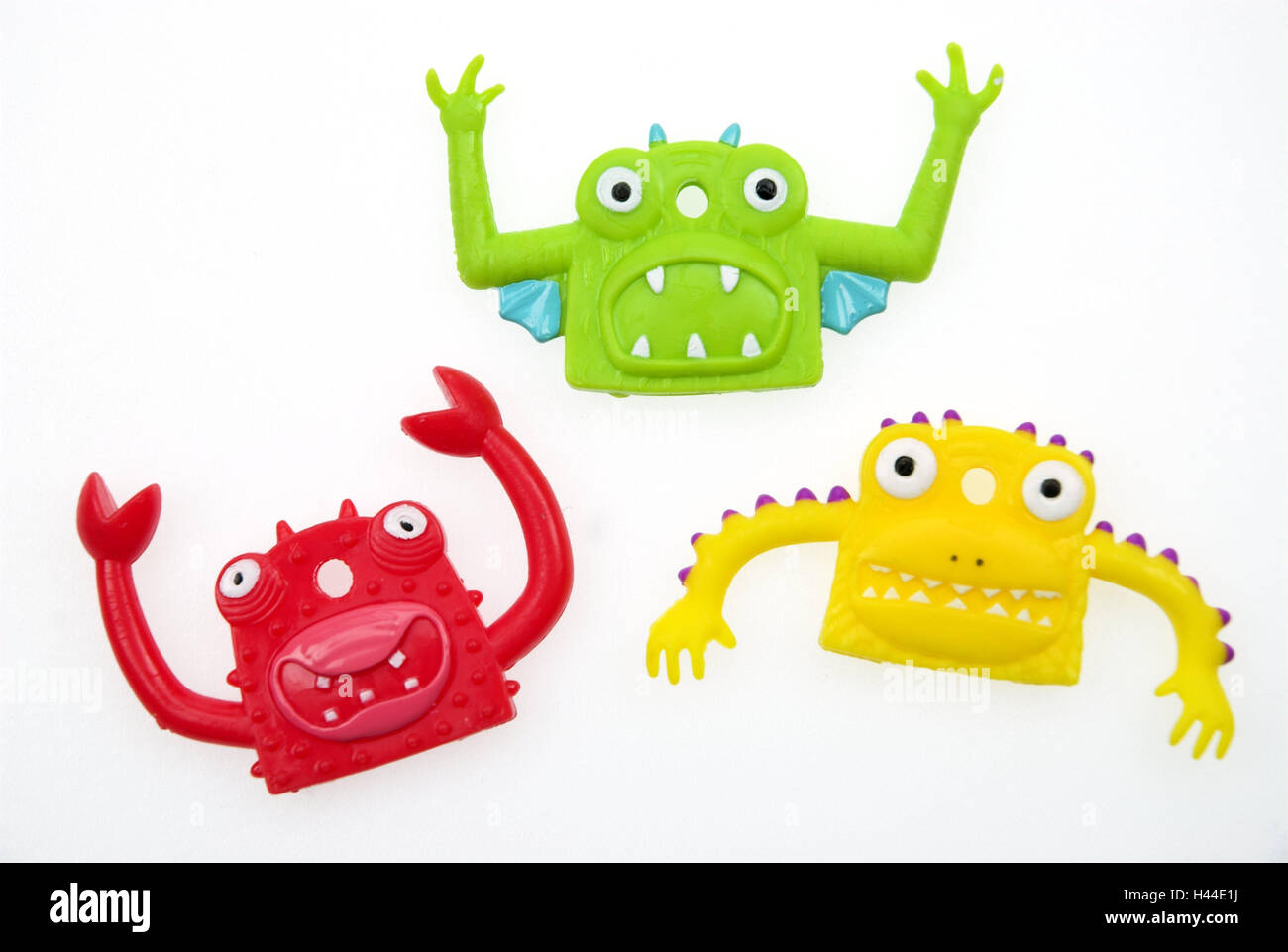 Elastic figures, monsters, monster figures, rubber, three, yellow ...