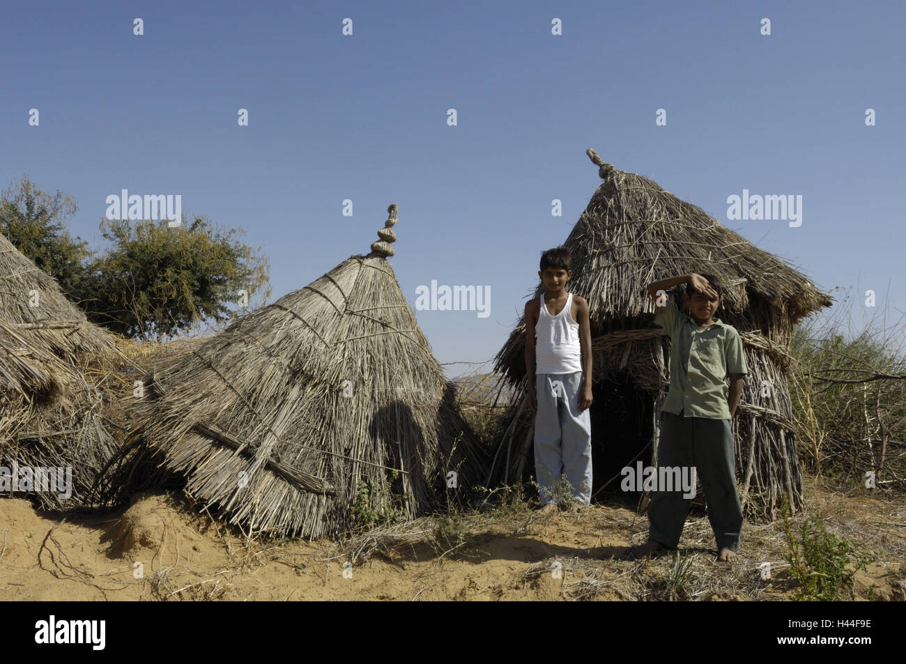 India, Rajasthan, Pushkar, children, straw hut, no model release Stock ...