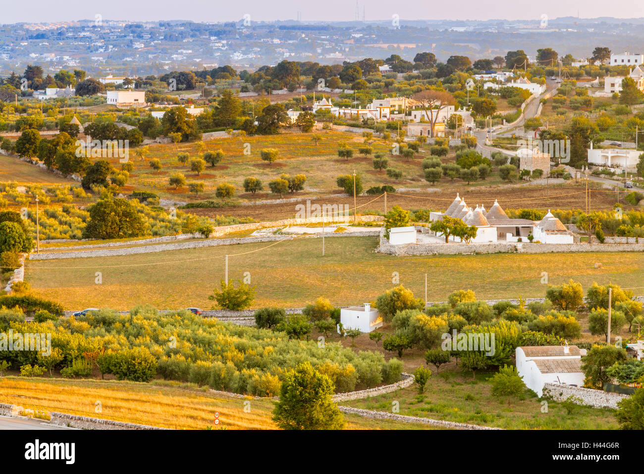 cultivated fields and white houses in the Itria Valley in Puglia Stock ...