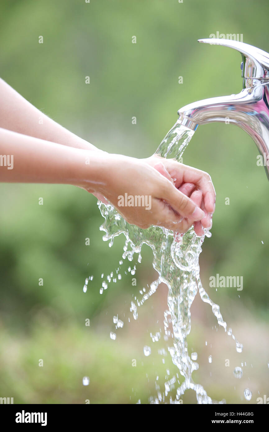Tap, jet water, hands Stock Photo - Alamy