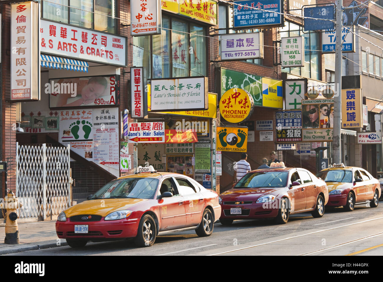 Canada, Ontario, Toronto, China Town, advertising signs, roadside, cars ...