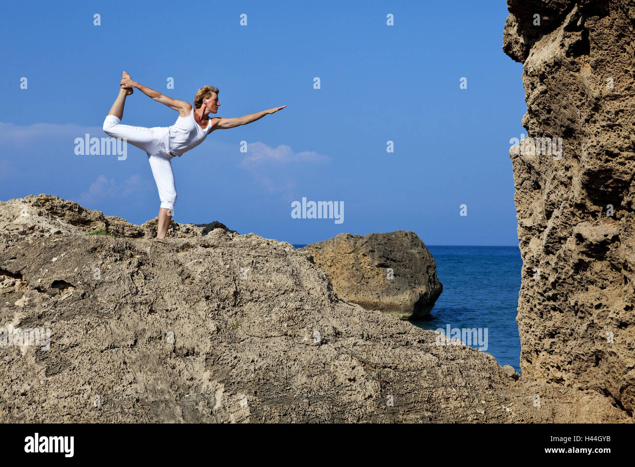 Greece, island Kefalonia, bile projection, woman, yoga practise Stock ...