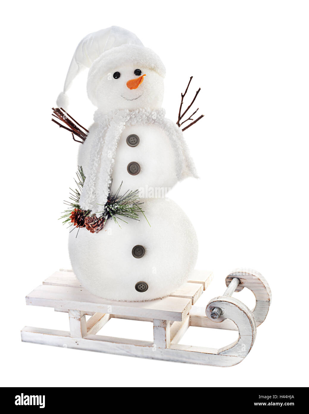 Snowman on sled isolated on white background Stock Photo - Alamy