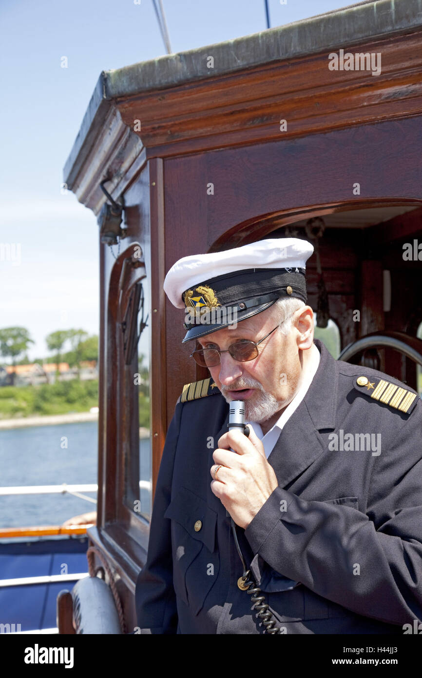 Ship, captain, microphone, announcement Stock Photo - Alamy