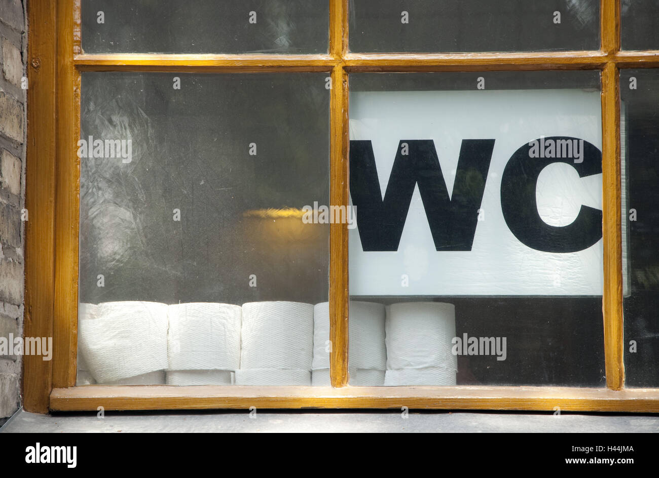 Toilet, window, sign Stock Photo - Alamy
