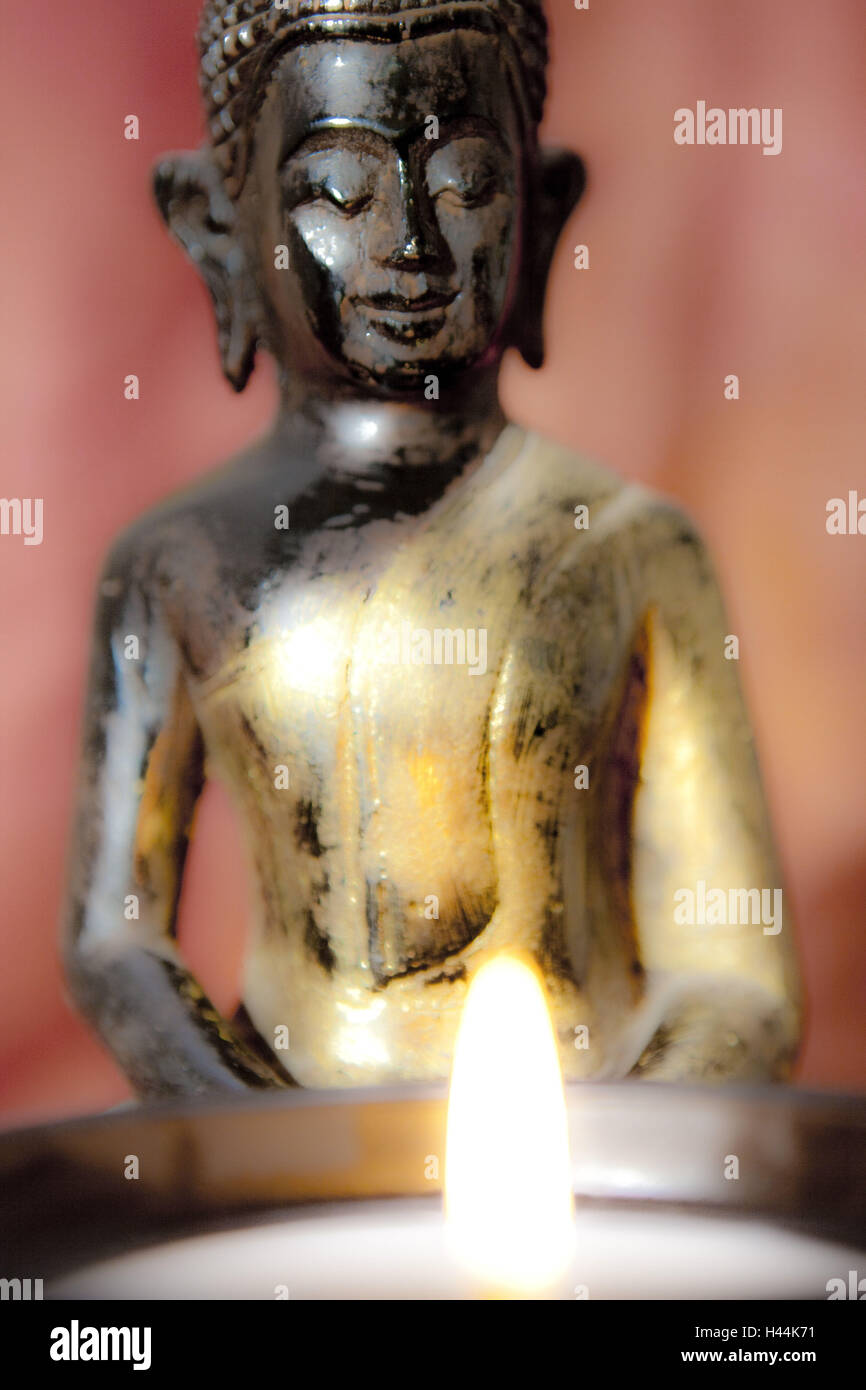 Buddha statue, candle Stock Photo - Alamy