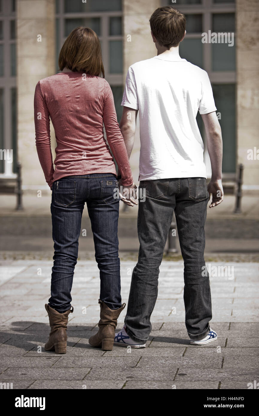 Teenager couple, in love, rear view Stock Photo - Alamy
