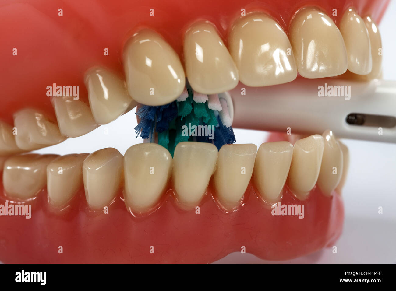 Bite prosthesis, electric toothbrush Stock Photo - Alamy