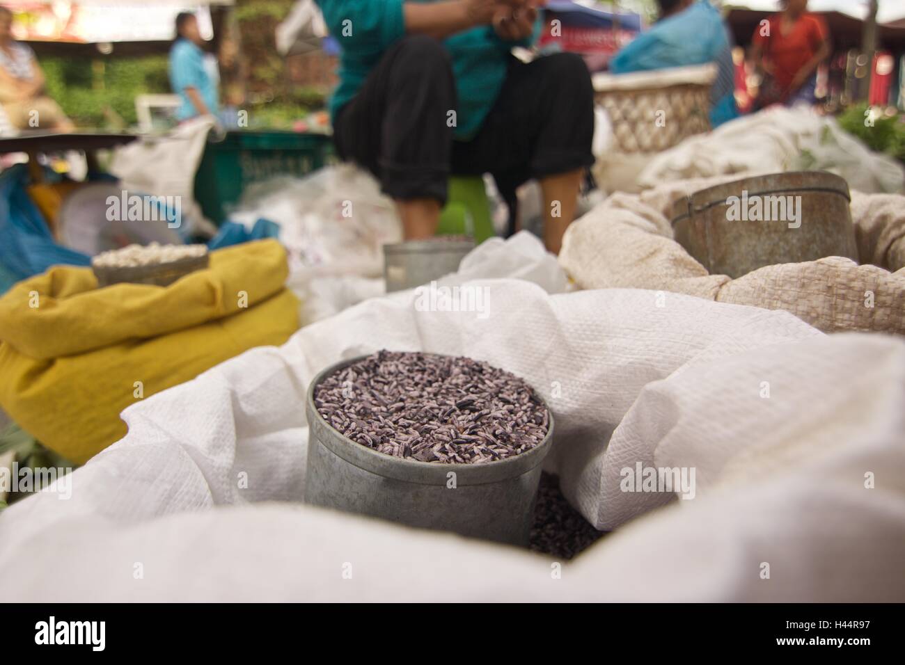 Red Rice in can bag at the market Stock Photo - Alamy