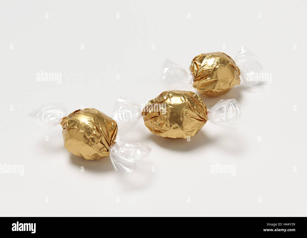 Gold Wrapped Sweets High Resolution Stock Photography and Images - Alamy